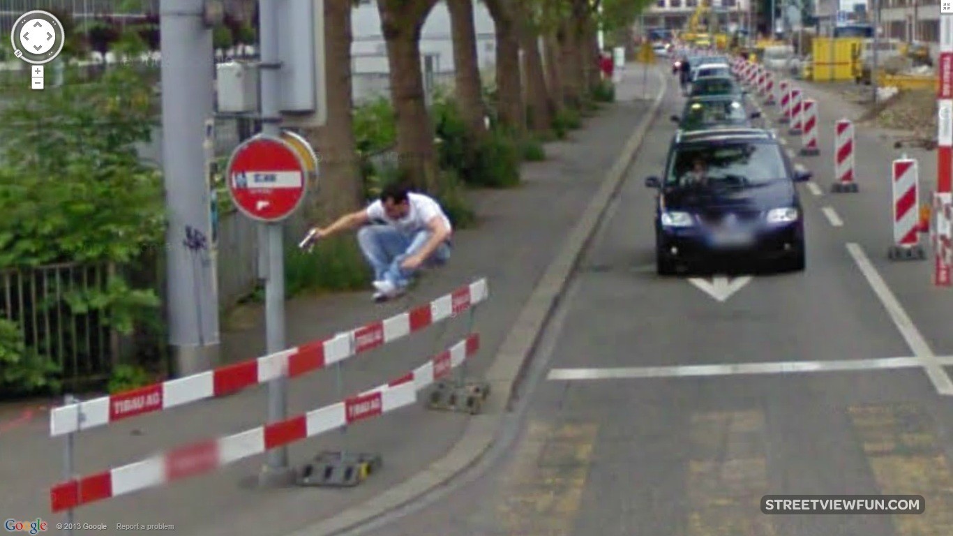 Guy levitating - STREETVIEWFUN