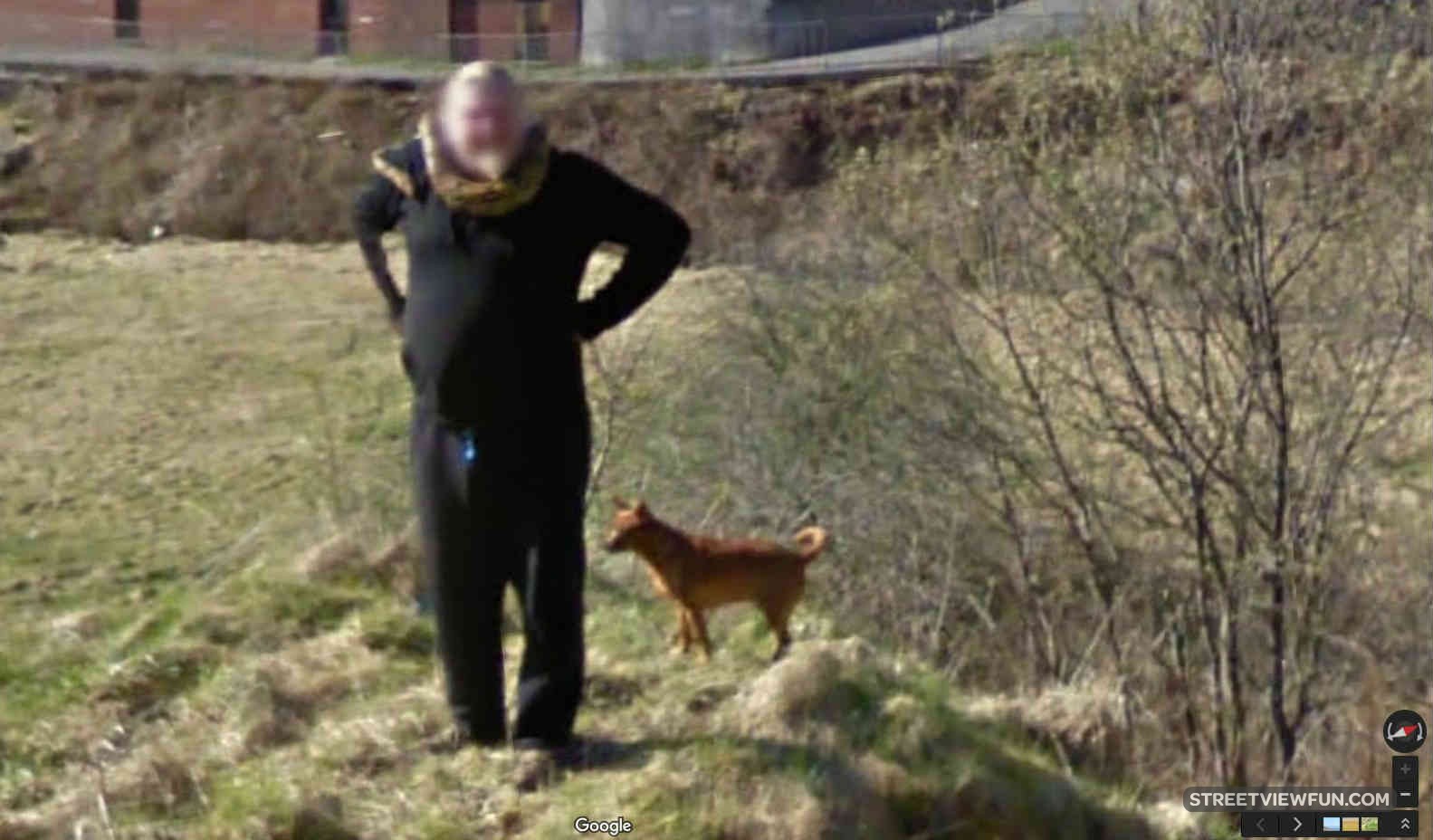 A man takes a morning walk with his snake - STREETVIEWFUN