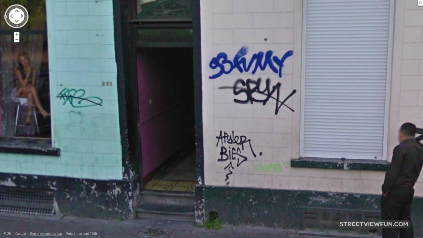 Pretending to check out a closed window - STREETVIEWFUN