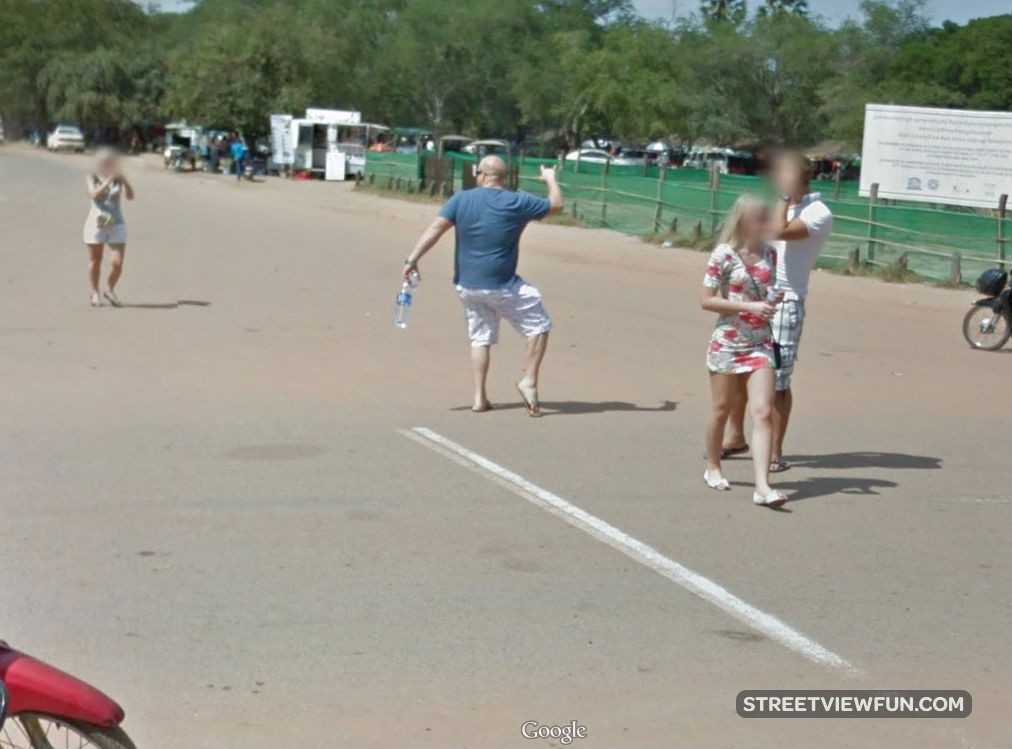 Posing in Angkor Wat - STREETVIEWFUN