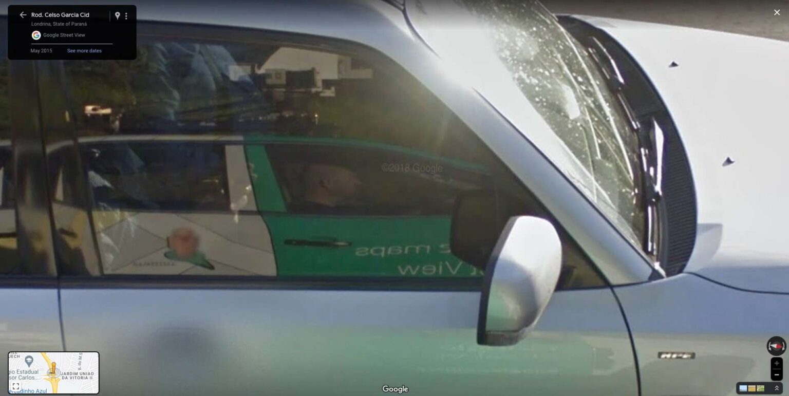 Google driver photographed by Google cameras, driving Google car ...
