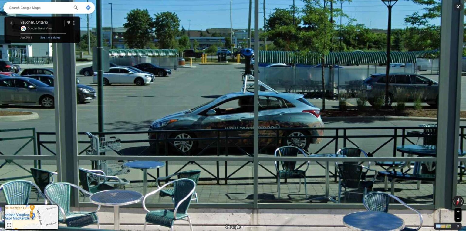 Google Car and Driver seen through the reflection - STREETVIEWFUN