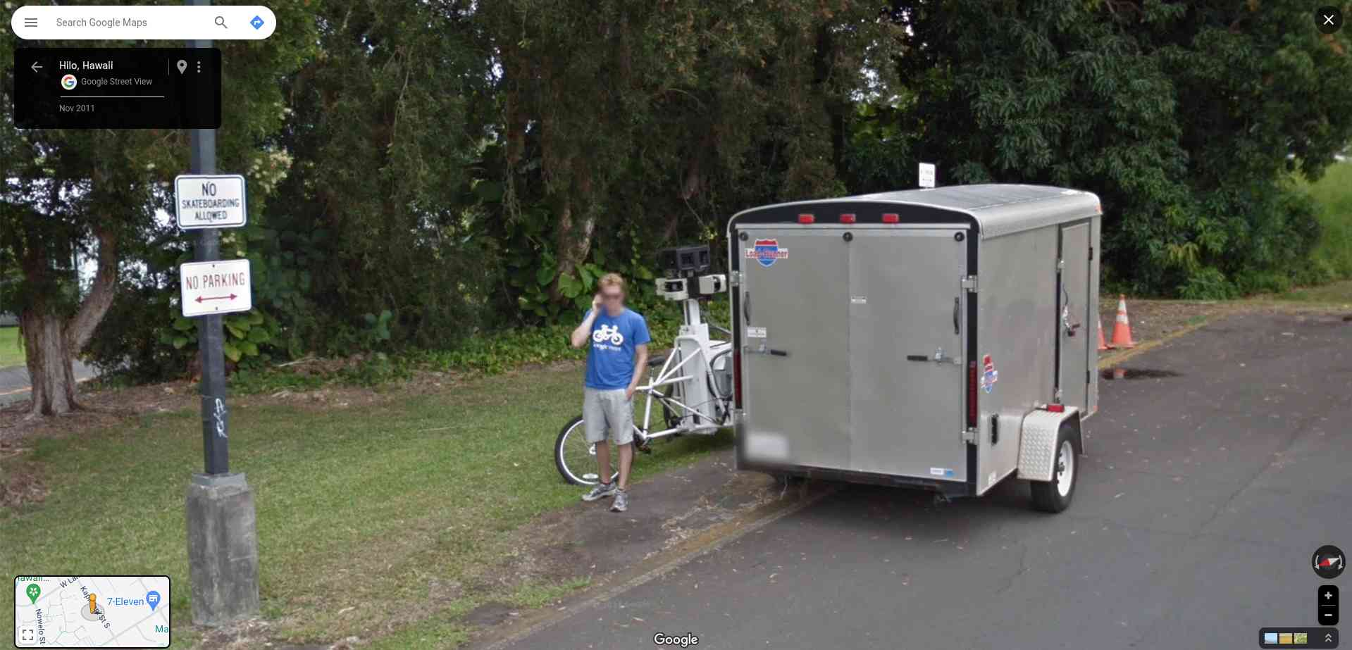 Google guy on the phone making a call, next to the Google tricycle ...