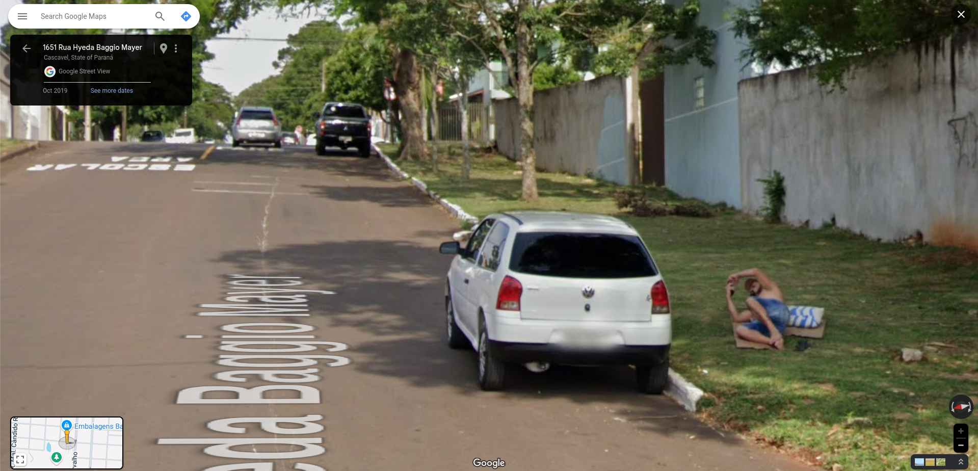 Resting in the shade and using cell phone - STREETVIEWFUN